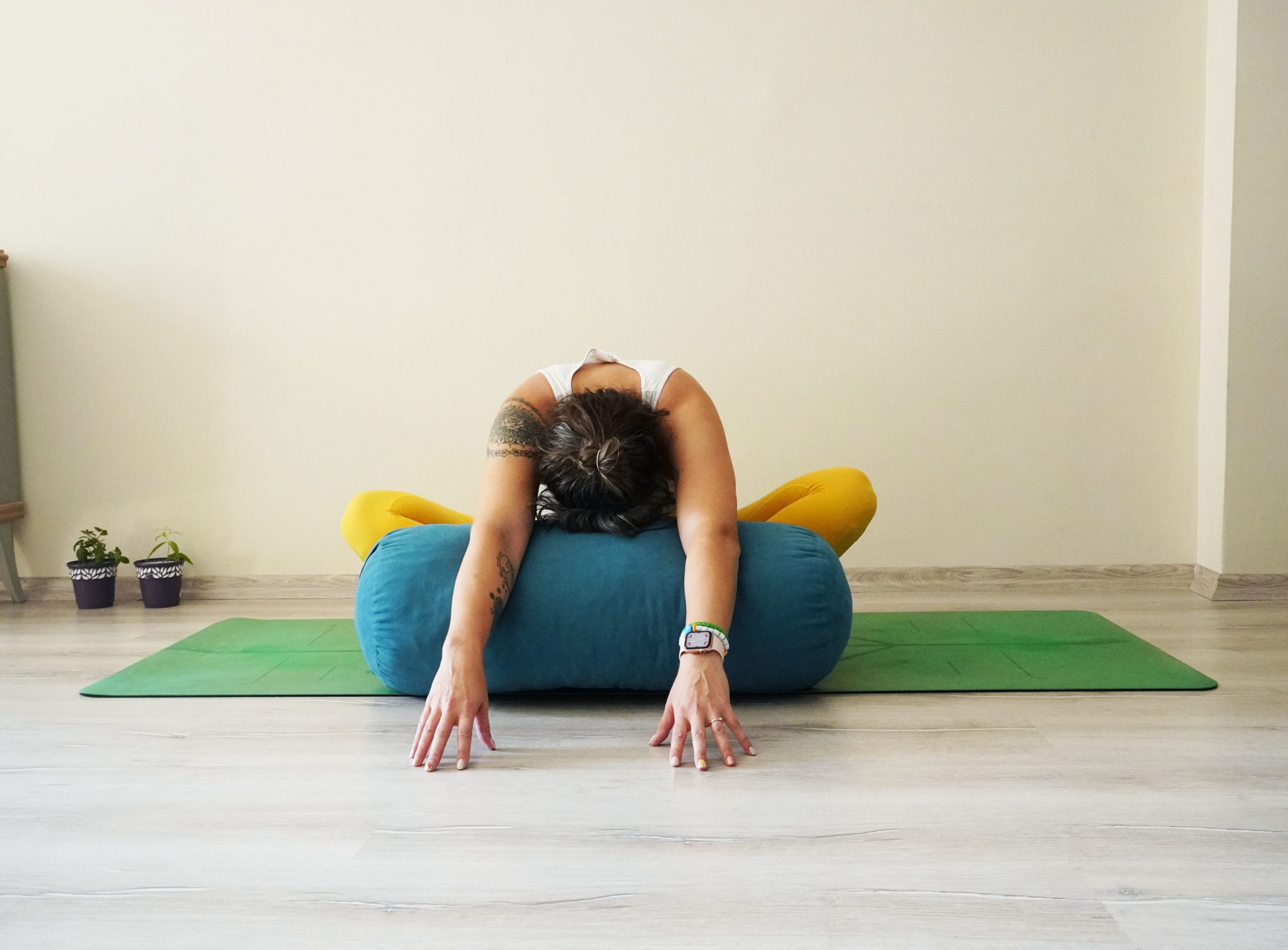 6 Ways Using a Bolster in Yoga Encourages Health - Yoga